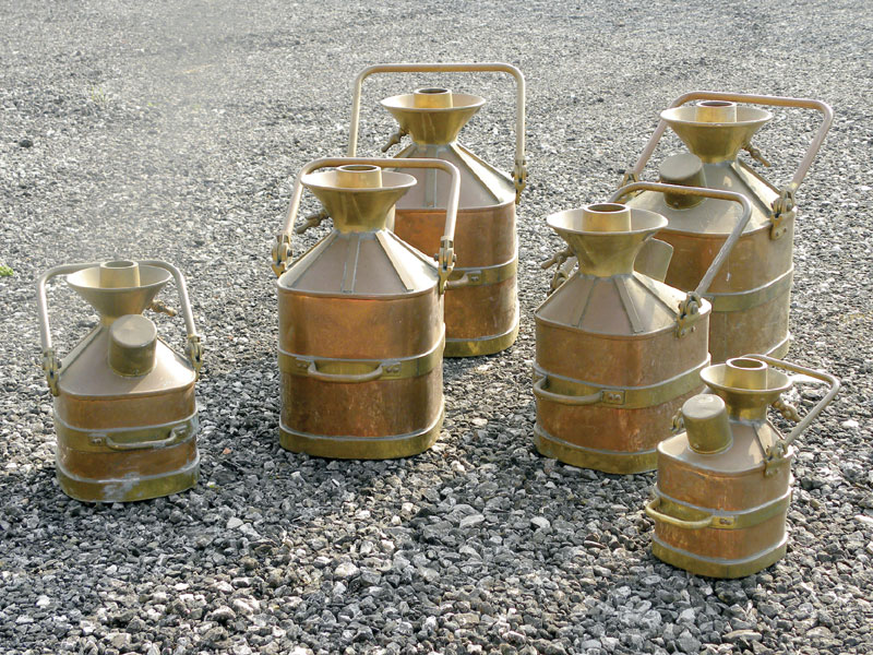 Lot 714 - Early Copper Petrol Measures
